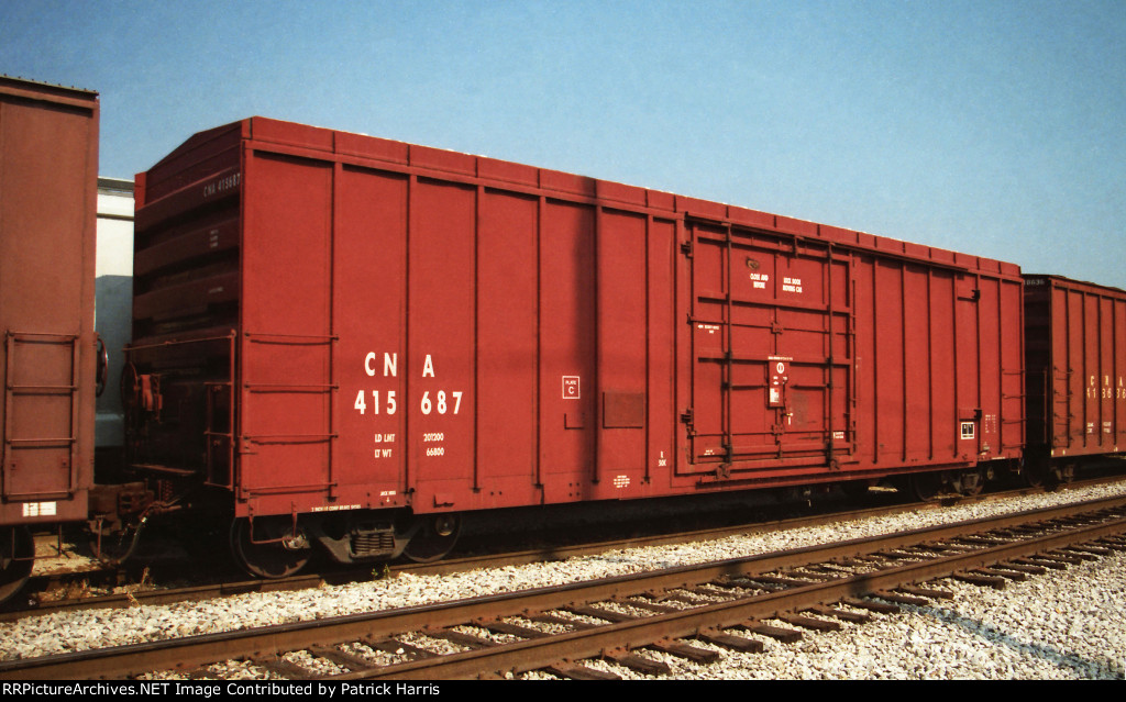 CNA 415687 FMC 5077cf 50-foot 6-inch exterior-post plug door box car rebuilt with extended roof ...